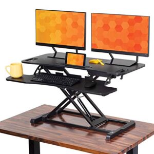 flexpro hero 37 inch standing desk | 2 level standing desk converter with keyboard shelf and monitor riser | large dual level sit to stand workspace | easily sit or stand in seconds! (black / 37″)