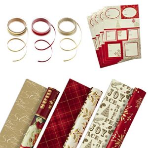 hallmark reversible christmas wrapping paper set with ribbon and gift tag stickers (traditional red and gold, 3 rolls of wrapping paper and ribbon)