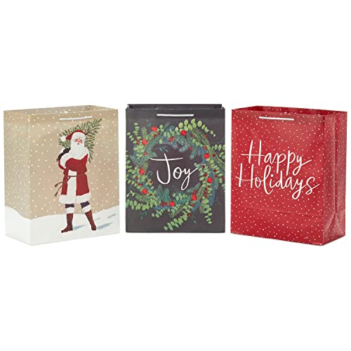 Hallmark 13" Large Christmas Gift Bag Bundle (3 Bags: "Joy" Wreath on Gray, Rustic Santa with Tree, "Happy Holidays" on Red) for Friends, Family, Teachers, Coworkers