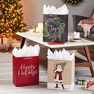 Hallmark 13" Large Christmas Gift Bag Bundle (3 Bags: "Joy" Wreath on Gray, Rustic Santa with Tree, "Happy Holidays" on Red) for Friends, Family, Teachers, Coworkers