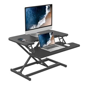 fezibo 28” height adjustable standing desk converter with usb charging port, quick sit to stand tabletop dual monitor, stand up desk riser for home office, black