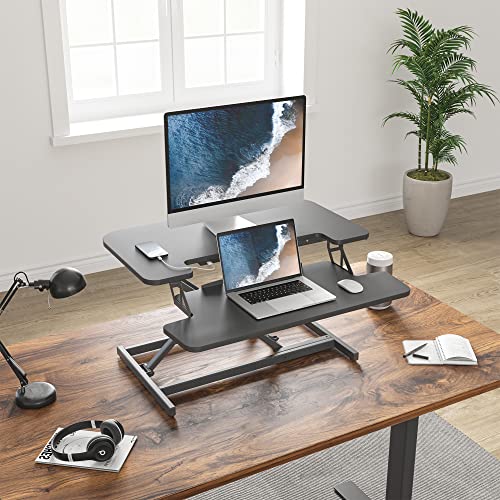 FEZIBO 28” Height Adjustable Standing Desk Converter with USB Charging Port, Quick Sit to Stand Tabletop Dual Monitor, Stand Up Desk Riser for Home Office, Black