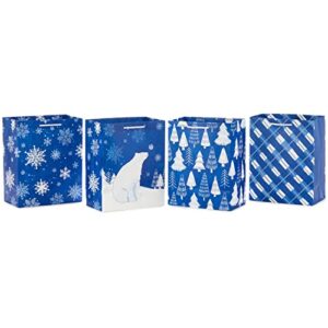 Hallmark 9" Medium Winter Gift Bags (4 Bags: Blue with Snowflakes, Plaid, Polar Bear, Christmas Trees) for Christmas, Hanukkah, Birthdays