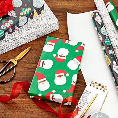 Hallmark Christmas Wrapping Paper for Kids with Cut Lines on Reverse (3 Rolls: 120 Sq. Ft. Ttl.) Multicultural Santa Claus, Ornaments on Black, "Merry Christmas" in Red, Green and Yellow