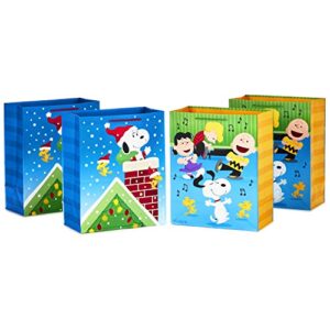 hallmark peanuts christmas gift bag bundle (4 large 13″ gift bags, 2 designs) snoopy, woodstock, charlie brown and friends