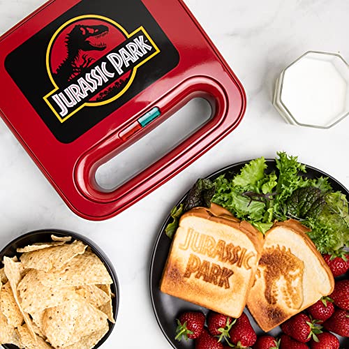 Uncanny Brands Jurassic Park Grilled Cheese Maker- Panini Press and Compact Indoor Grill- Opens 180 Degrees for Burgers, Steaks, Bacon