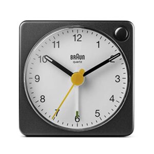 braun classic travel analogue alarm clock with snooze and light, compact size, quiet quartz movement, crescendo beep alarm in black and white, model bc02xbw.