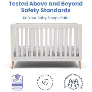 Delta Children Essex 4-in-1 Convertible Baby Crib, Bianca White with Natural Legs + Delta Children Twinkle Galaxy Dual Sided Recycled Fiber Core Crib and Toddler Mattress (Bundle)