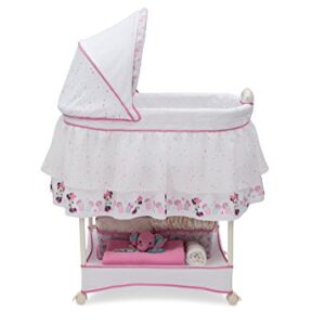 Delta Children Gliding Bedside Bassinet - Portable Crib with Lights, Sounds and Vibration, Disney Minnie Mouse Boutique