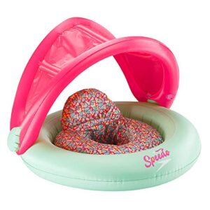 speedo baby swim flotation baby cruiser with canopy begin to swim , bright pink