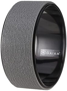 gaiam yoga wheel – multi-purpose yoga prop & back stretcher – assists with flexibility, releasing tension in back, chest, and spine – textured non-slip surface, durable core – 5″w x 12″ diameter