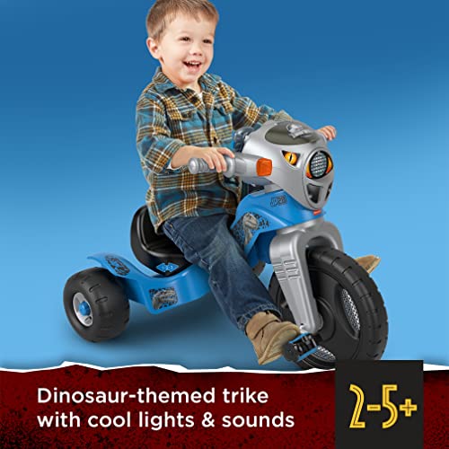 Fisher-Price Jurassic World Velociraptor Dinosaur Tricycle, Toddler Toy Ride-On with Lights Sounds Walkie-Talkie and Storage Area