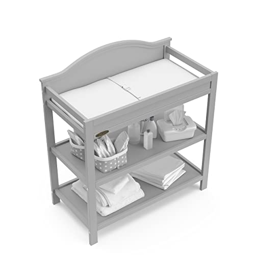 Graco Clara Changing Table (Pebble Gray) - GREENGUARD Gold Ceritifed, Includes Bonus Water-Resistant Changing Table Pad with Safety Strap, 2 Open Shelves