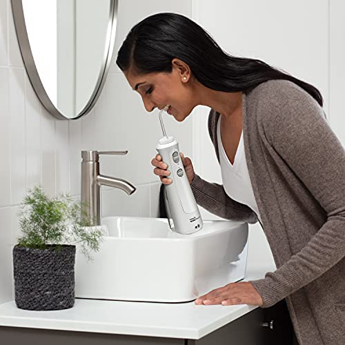 Waterpik Cordless Pearl Rechargeable Portable Water Flosser for Teeth, Gums, Braces Care and Travel with 4 Flossing Tips, ADA Accepted, WF-13 White