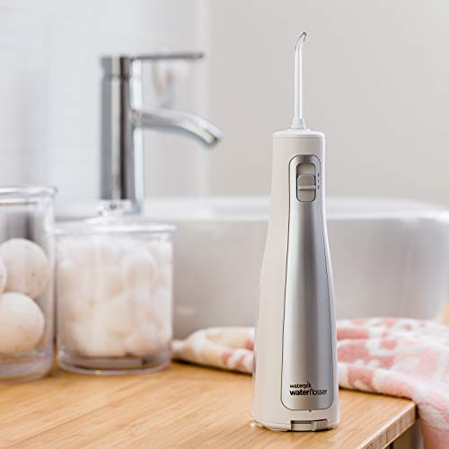 Waterpik Water Flosser Cordless Dental Oral Irrigator for Teeth with Portable Travel Bag and 3 Jet Tips, Cordless Freedom ADA Accepted, WF-03, White