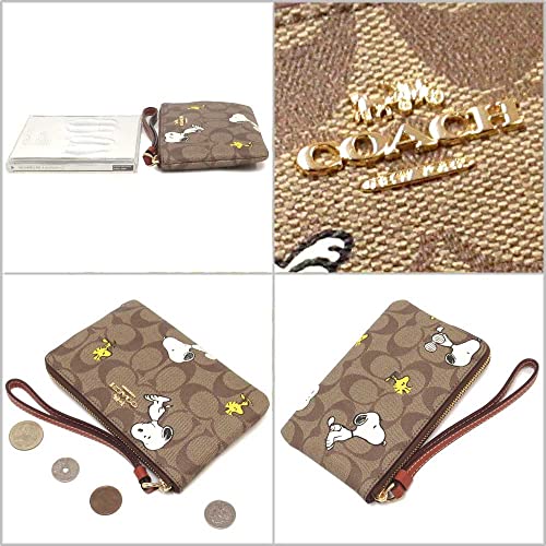 Coach X Peanuts Corner Zip Wristlet In Signature Canvas With Snoopy Woodstock Print