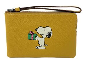 coach x peanuts corner zip wristlet with snoopy present motif