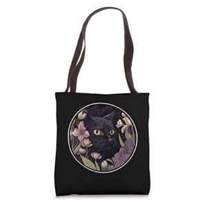 cute black cat hiding in spring flowers aesthetic black cat tote bag