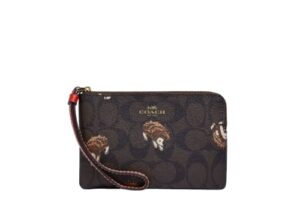 corner zip wristlet in signature canvas with hedgehog print