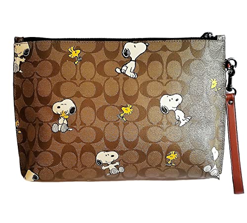 COACH Peanuts Carry All Pouch With Snoopy Woodstock Print