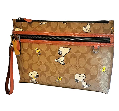 COACH Peanuts Carry All Pouch With Snoopy Woodstock Print