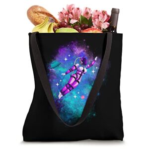 Spacewoman in a suit drifting in space Tote Bag