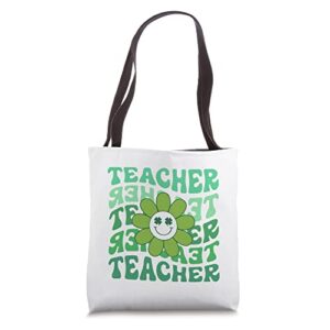 retro groovy wavy teacher smiling face daisy st patricks day tote bag