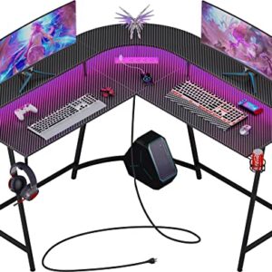 SUPERJARE L Shaped Gaming Desk with Power Outlets & LED Lights, Carbon Fiber Surface, Computer Desk with Monitor Stand, Home Office Desk Corner Desk with Cup Holder & Hooks, Black