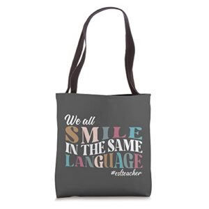 we all smile in the same language esl teachers tote bag