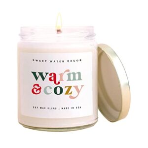 sweet water decor warm and cozy soy candle | orange peel, cinnamon, ginger, clove, cypress, and pine and fir balsam scented candles for home | 9oz clear jar, 40+ hour burn time, made in the usa