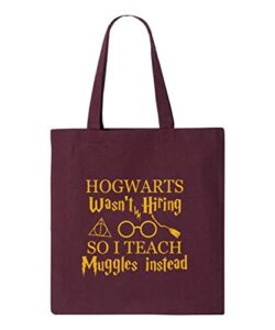 hogwarts wasn’t hiring so i teach muggles instead teacher tote bag (small, garnet)