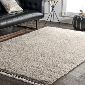 nuloom neva modern tasseled shag area rug, 5′ 3″ x 7′ 7″, beige