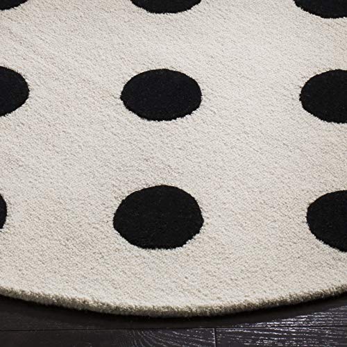 SAFAVIEH Kids Collection 5' Round Ivory / Black SFK904D Handmade Polka Dot Wool Area Rug