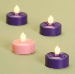 set of 4 led lighted christmas purple and pink tea light candles