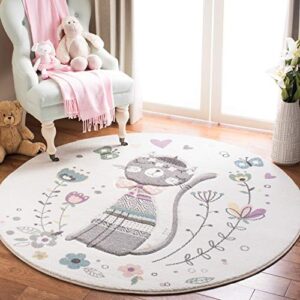 safavieh carousel kids collection 5’3″ round ivory / pink crk187a cat nursery playroom area rug