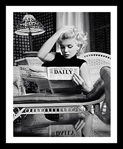 Buyartforless Framed Marilyn Monroe Reading Motion Picture Daily 1955 by Ed Feingersh 20x16 Photograph Art Print Poster