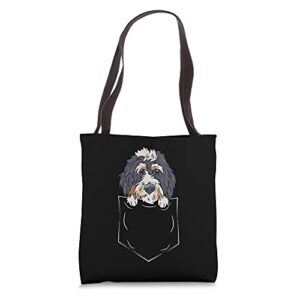 bernedoodle dog in a pocket pet funny bernedoodle tote bag