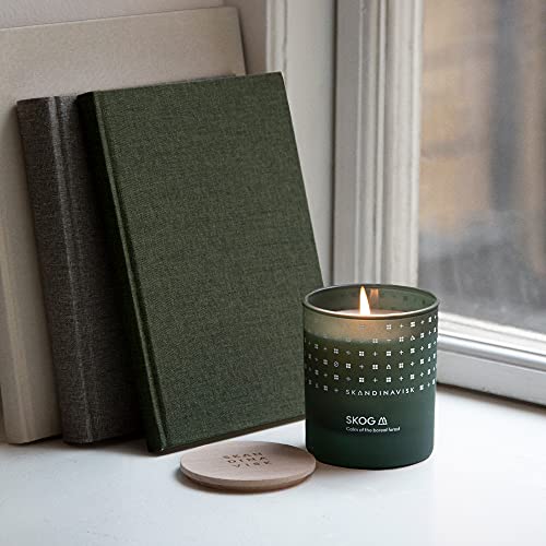 Skandinavisk Skog 'Forest' Scented Candle. Fragrance Notes: Pine Needles and Fir Cones, Birch Sap and Lily of The Valley. 7.0 oz.