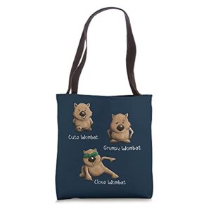 cute grumpy and close wombat funny marsupial poses pun tote bag