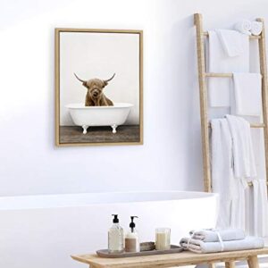 Kate and Laurel Sylvie Highland Cow in Tub Color Framed Canvas Wall Art by Amy Peterson, 18x24 Natural, Chic Animal Art for Wall