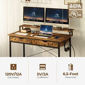 Rolanstar Computer Desk with 2 Drawers and Power Outlet, 47" Home Office Writing Desk with Monitor Stand, Workstation Table with Stable Metal Frame, Rustic Brown