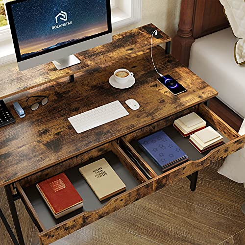 Rolanstar Computer Desk with 2 Drawers and Power Outlet, 47" Home Office Writing Desk with Monitor Stand, Workstation Table with Stable Metal Frame, Rustic Brown