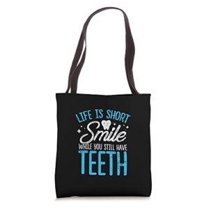 life is short smile while you still have teeth dentistry tote bag