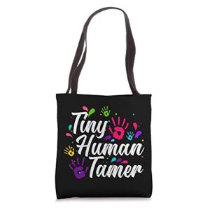 tiny human tamer kindergarten teacher daycare provider tote bag