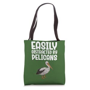 easily distracted by pelicans funny pelican tote bag