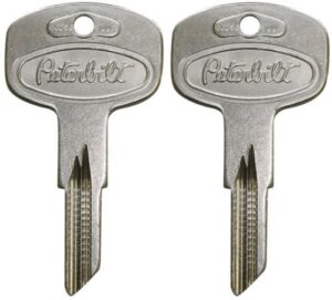 (320774) 2 new peterbilt truck fit models 1981-2004 oem key blank-factory original w/logo