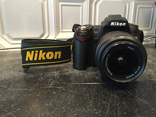 Nikon D90 12.3MP DX-Format CMOS Digital SLR Camera with 18-55 mm Nikon Zoom Lense + 55-200 mm Nikon Zoom Lense