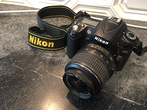 Nikon D90 12.3MP DX-Format CMOS Digital SLR Camera with 18-55 mm Nikon Zoom Lense + 55-200 mm Nikon Zoom Lense