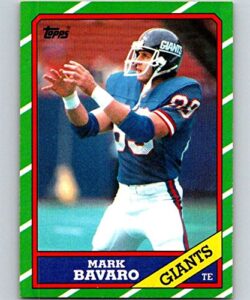 1986 topps football #144 mark bavaro rc rookie new york giants official nfl trading card (stock photo used – centering varies, nrmt or better otherwise)