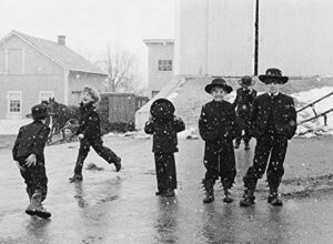 amish children playing in snow, lancaster, pennsylvania, 1969